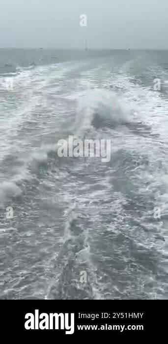 ocean water Ship wake on the ocean. Water foam trace behind the large ...