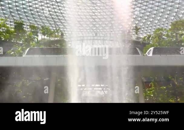 Rain Vortex Waterfall inside Jewel Changi, Singapore, with skytrain ...
