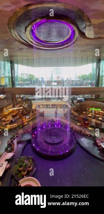 Footage of Alangkarn dancing indoor waterfall, standing 15-meter tall ...