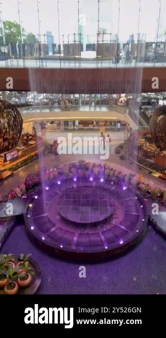 Footage of Alangkarn dancing indoor waterfall, standing 15-meter tall ...