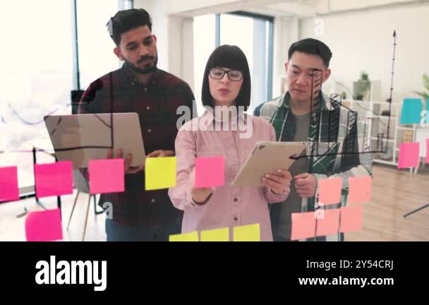 Team collaboration session with diverse colleagues brainstorming using ...