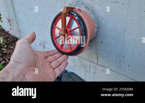 outlet of the drainage pipe with flap against the entry of rodents. the ...