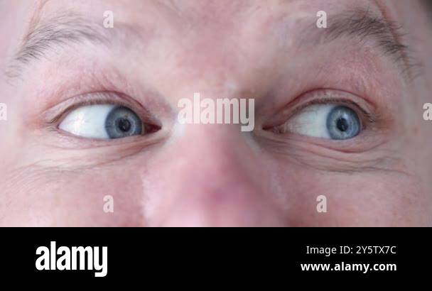 Blue male eyes make charging and playful expression of eyes. Gymnastics ...