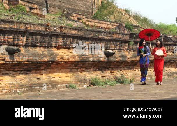 Myanmar Woman in traditional Myanmar suit sightseeing and travel at ...