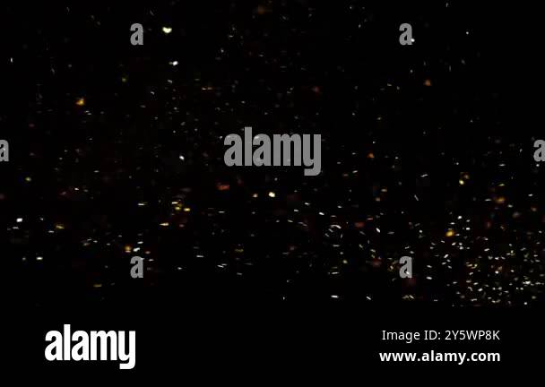 Realistic floating embers particles on black screen background.You can ...