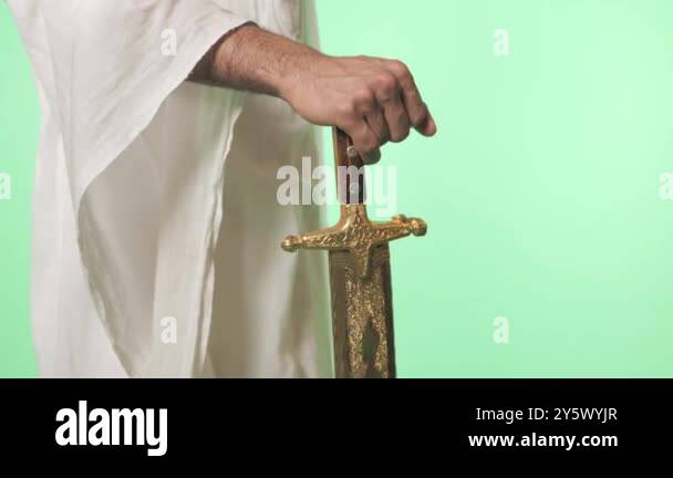 Traditional Saudi out-feet on chromakey. Arabian long saber - saif. The ...