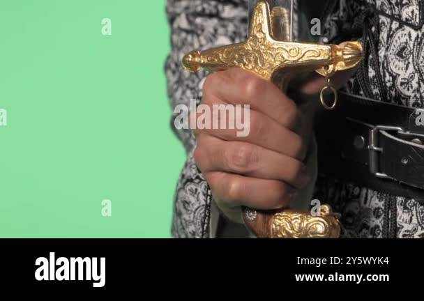 Traditional Saudi out-feet on chromakey. Arabian long saber - saif. The ...