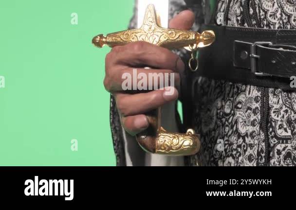 Traditional Saudi out-feet on chromakey. Arabian long saber - saif. The ...