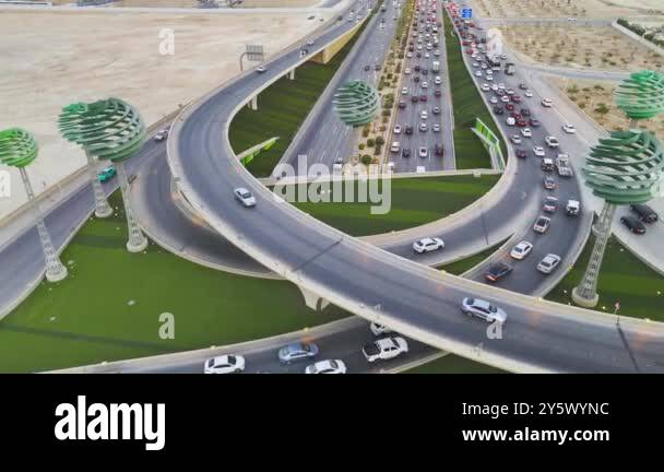 Drone view of busy motorway The Green Field Riyadh KSA. This video ...