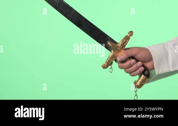 Traditional Saudi out-feet on chromakey. Arabian long saber - saif. The ...