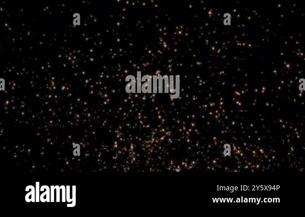 Abstract animation loop glow gold stars particles flow up on black ...