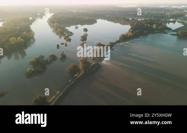 The waters of the Odra River flowing over flood embankments during the ...