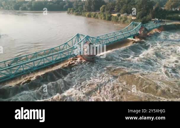 Foaming water of the Odra River at the Bartoszowicki weir during the ...