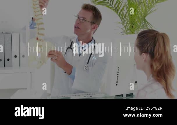 Doctor explaining spine model to patient, audio waveform animation over ...
