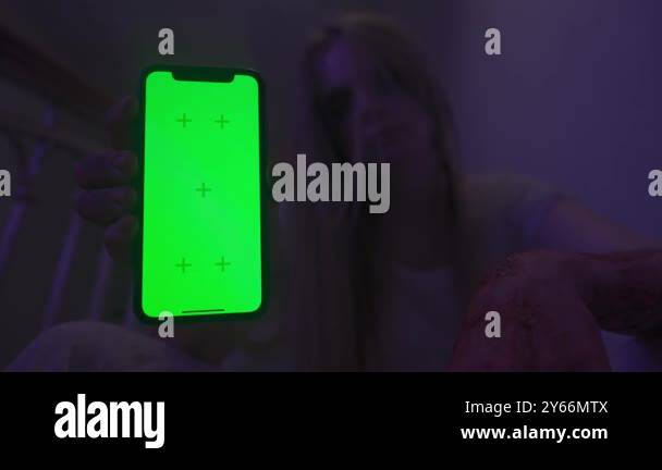 Young female on stairway in darkness. Creepy ghost woman in dress ...