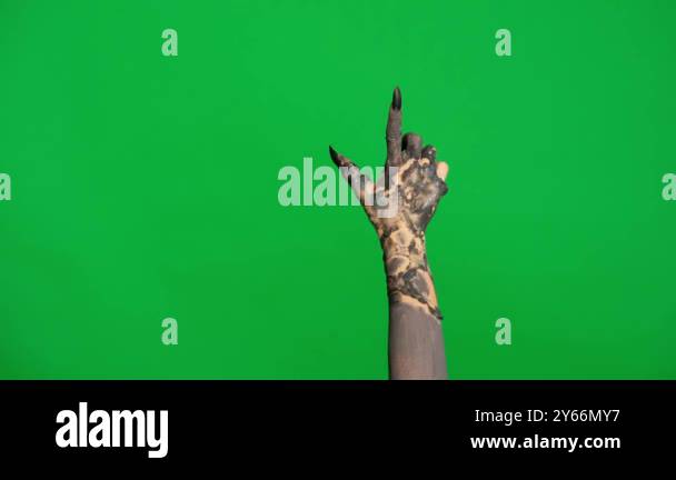 Scary hand showing gestures in studio. Creepy halloween monster hand in ...
