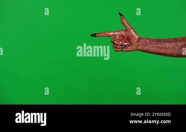 Scary hand showing gestures in studio. Creepy halloween monster hand in ...