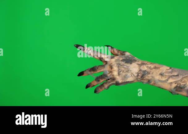 Scary hand showing gestures in studio. Creepy halloween monster hand in ...