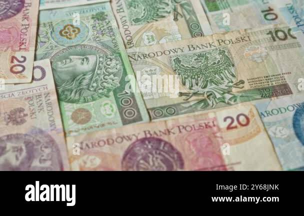Polish banknotes scattered in a flat layout displaying various ...