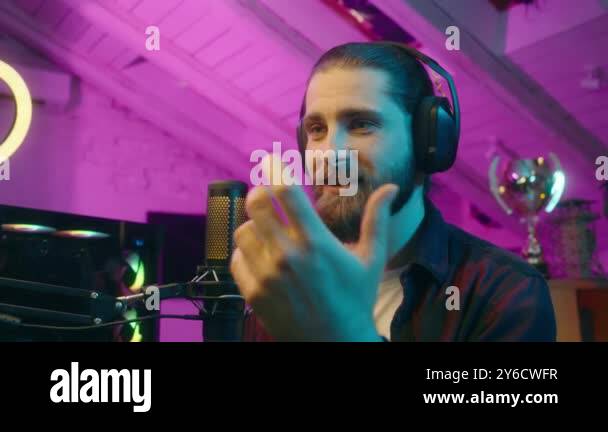 Happy Caucasian male blogger streamer addicted influencer talking in ...