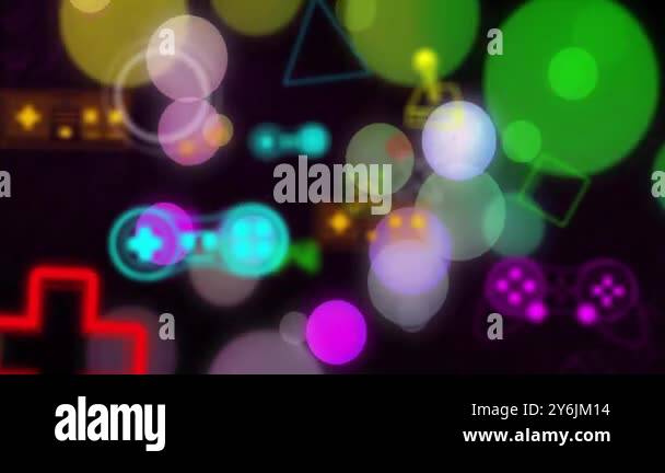 Colorful gaming icons and shapes animation over blurred lights ...