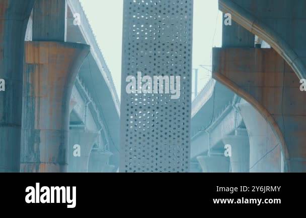 A modern architectural view of a bridge structure with intricate ...