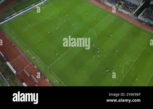 Drone footage of a football match from a top-down view, showcasing ...