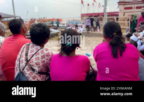 Varanasi, Uttar Pradesh, India - 30 August 2024: Tourist family seated ...