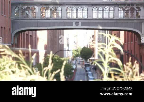 New York City street, Chelsea Market skybridge. Retro industrial ...
