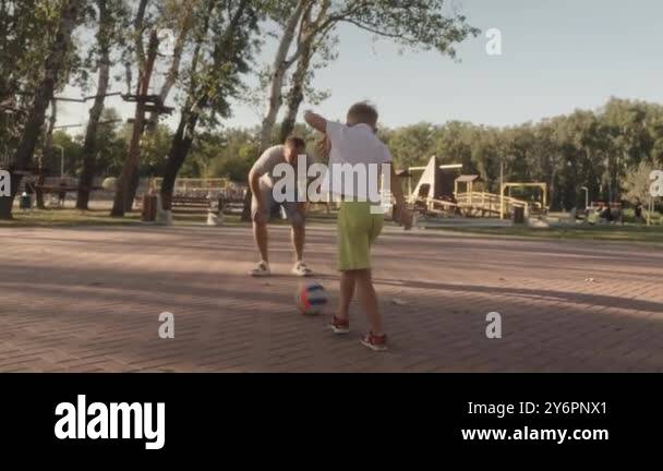 Father son playing soccer ball Stock Videos & Footage - HD and 4K Video ...