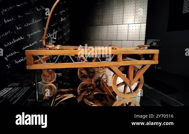 This professionally photographed scene displays a detailed wooden cart ...