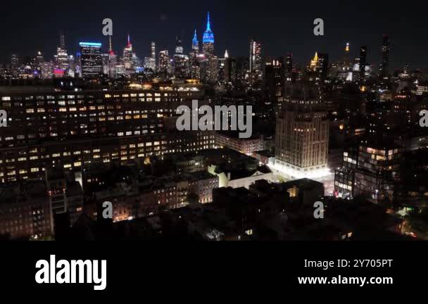 Flight above the New York City Manhattan panoramic view at dusk from the Hudson River. The view ...