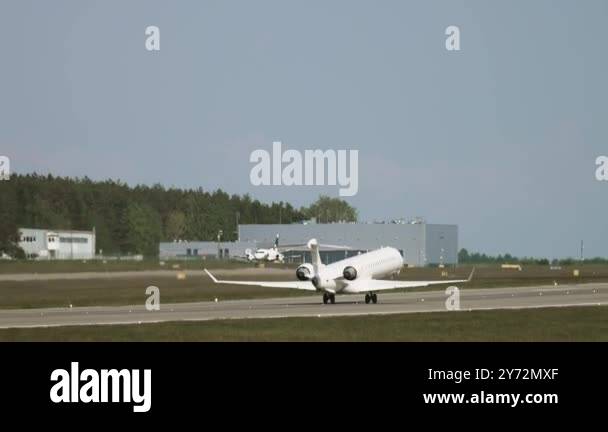 Commercial Aircraft Taking off From Airport Runway on Clear Day With ...
