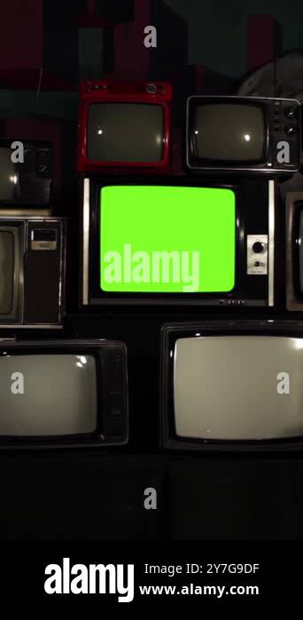 Vintage TVs Stacked with One Green Screen TV in the Middle - Vertical ...