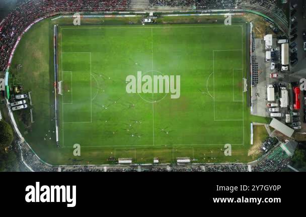 Drone footage of a football match from a top-down view, showcasing ...