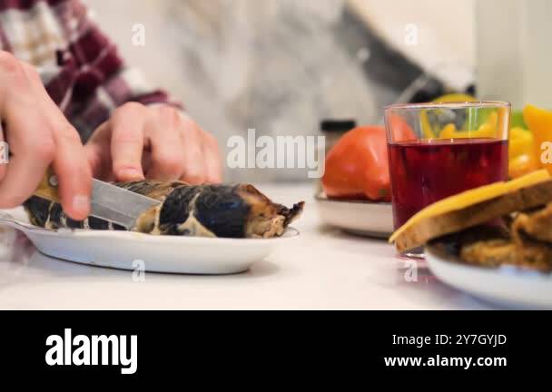 Man eats fish Stock Videos & Footage - HD and 4K Video Clips - Alamy