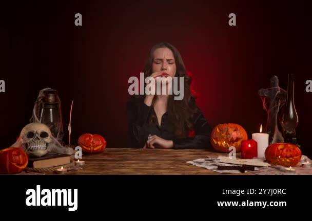 Mystic woman wizard doing witchcraft. Halloween gothic woman witch ...
