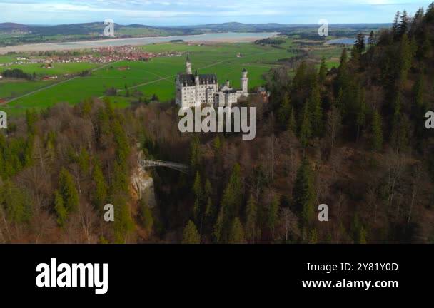 Aerial view Neuschwanstein Castle and bridge Marienbrucke across Pollat ...