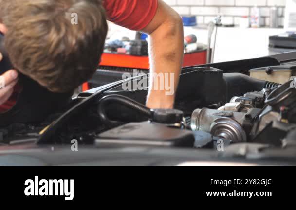Man fixing engine of car Stock Videos & Footage - HD and 4K Video Clips ...