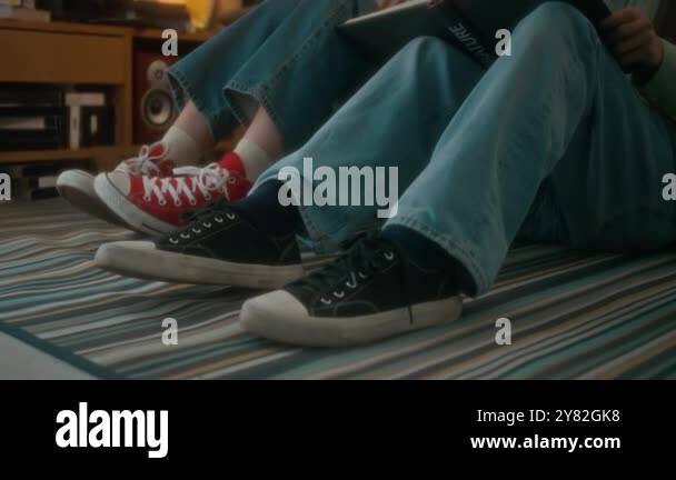 Red plimsolls Stock Videos & Footage - HD and 4K Video Clips - Alamy
