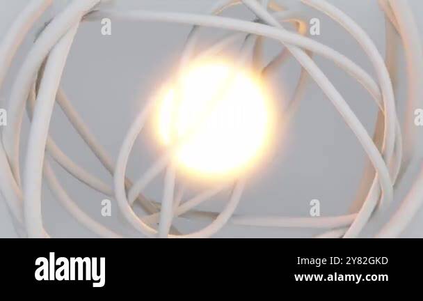 A close up shot of a warm light featuring a geometric design and ...