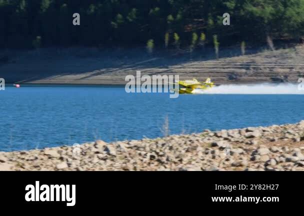 Air Tractor AT-802A aircraft adapted for aerial firefighting collecting ...