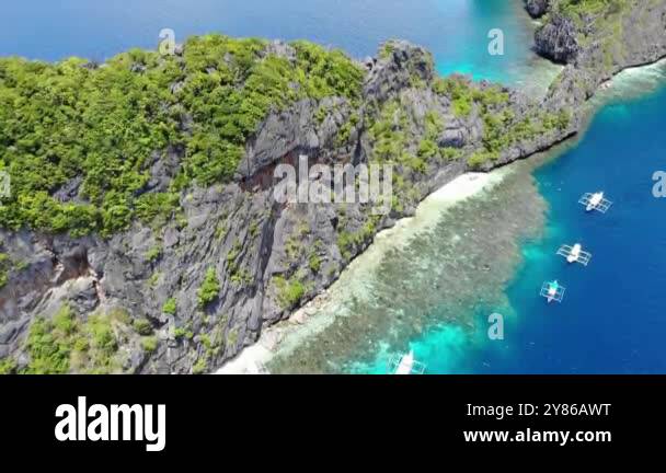 Drone footage of islands, mountains, and beaches captured during an ...