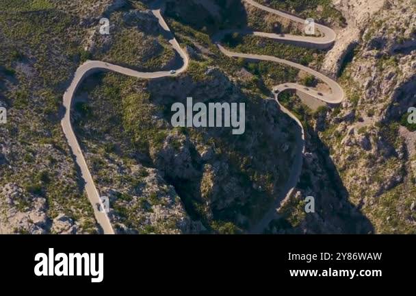 Drone footage of famous cycling race track. Bend of serpentine, winding ...