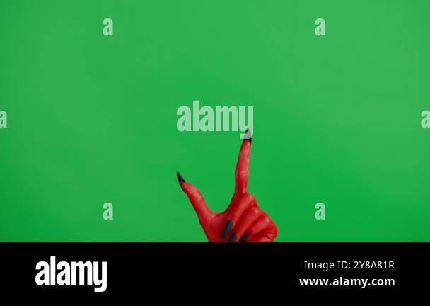 Scary hand showing gestures in studio. Creepy halloween devil monster ...