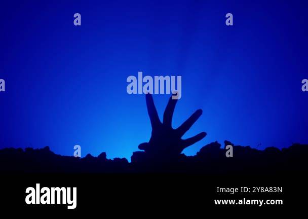 Creepy monster hand gestures in graveyard. Scary dirty halloween zombie ...