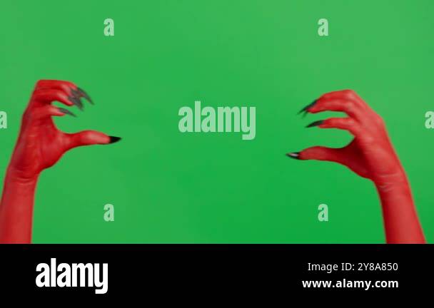 Scary hand showing gestures in studio. Creepy halloween devil monster ...