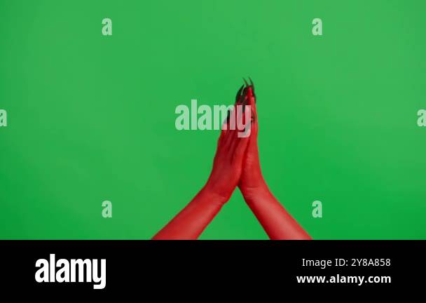 Scary hand showing gestures in studio. Creepy halloween devil monster ...