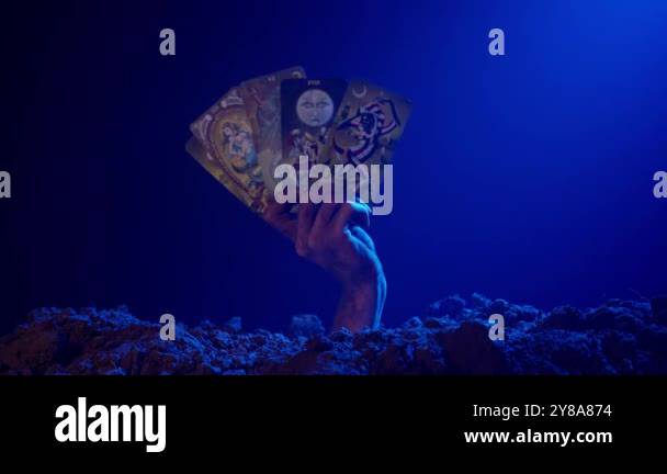 Creepy monster hand shows gestures in graveyard. Scary dirty halloween ...