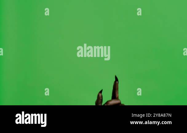 Scary hand showing gestures in studio. Creepy halloween devil monster ...